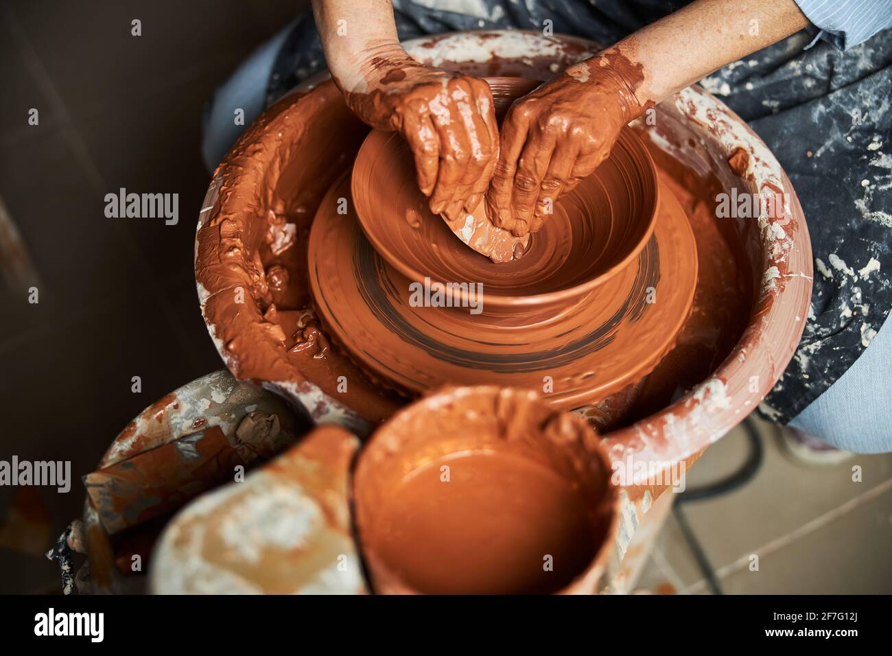 Female ceramic artist making pottery in workshop Stock Photo - Alamy