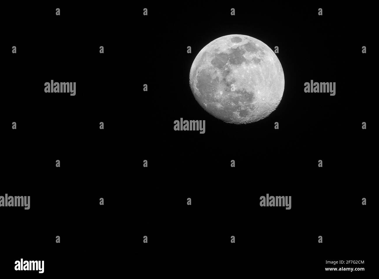 almost full moon on night sky close up details Stock Photo - Alamy