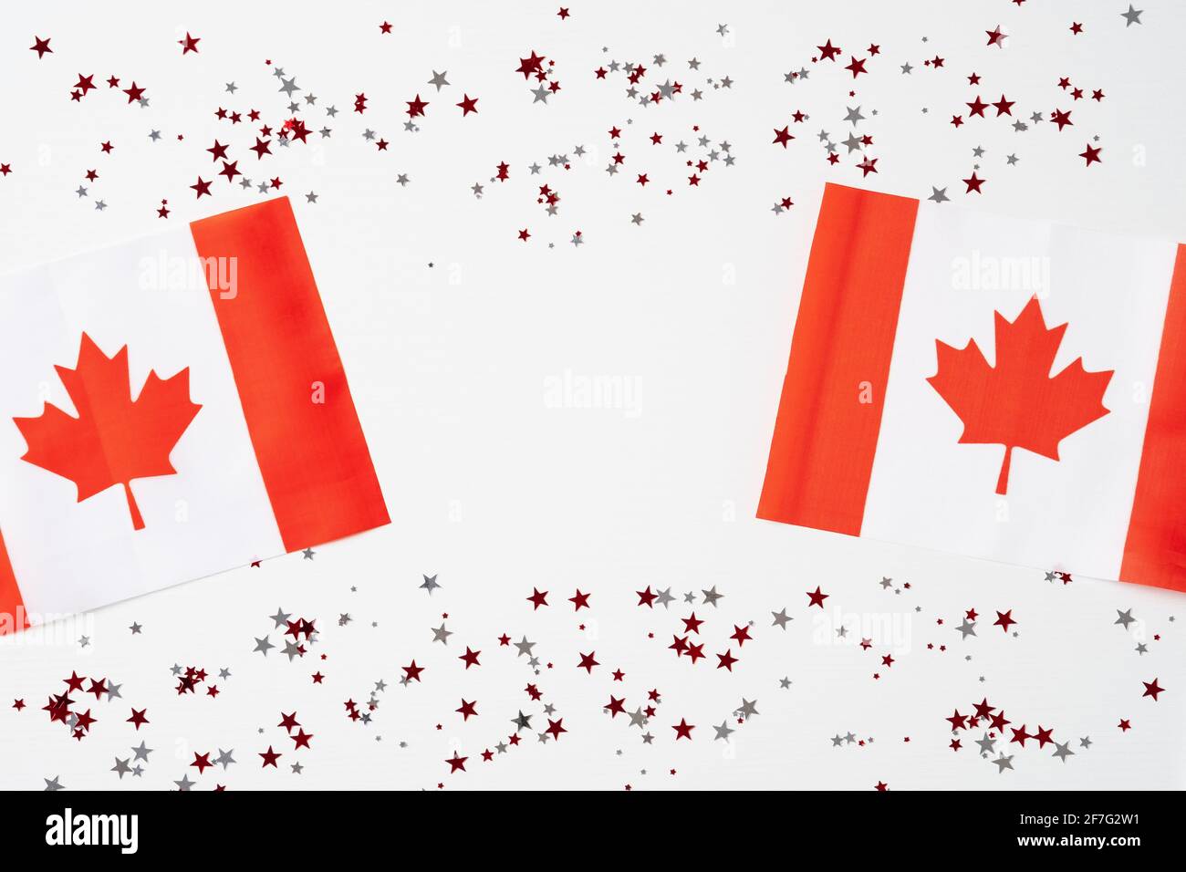 Happy Canada Day greeting card design. Canadian flags with maple leaves ...