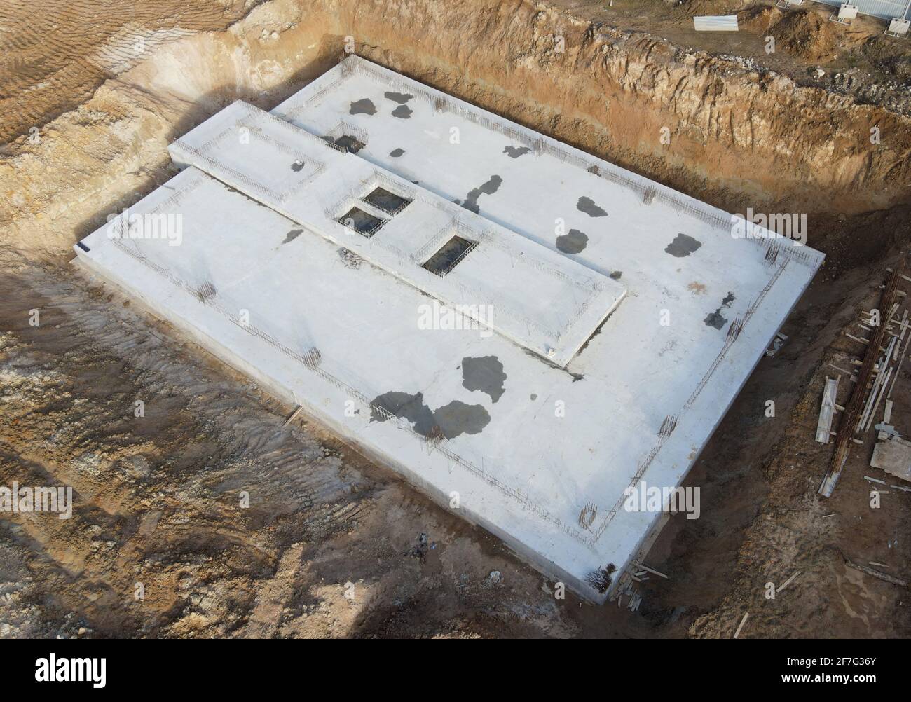 Aerial view of a сonstruction site with foundation pit for monolithic ...