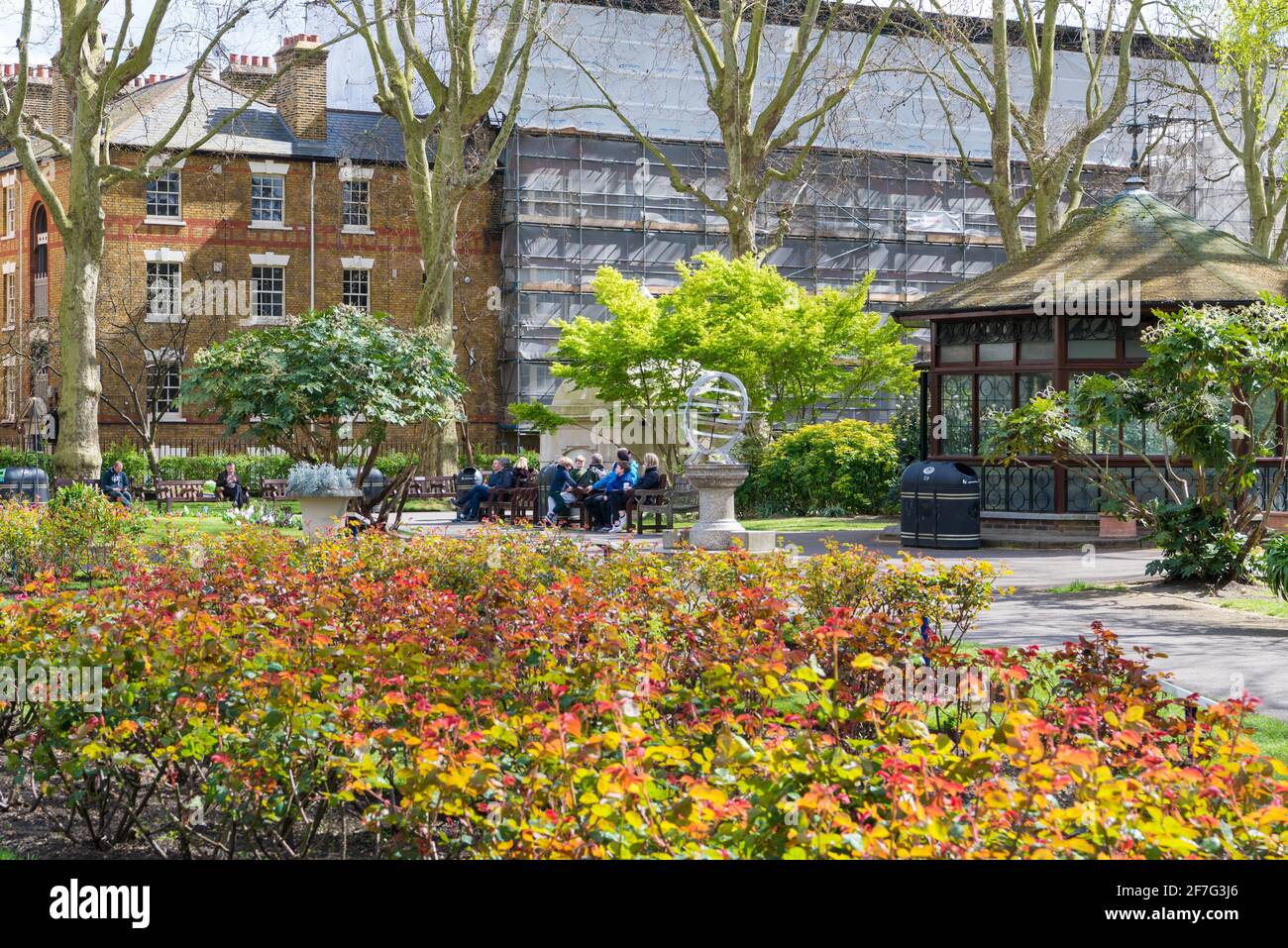 People socialising and enjoying a sunny spring day in Paddington Street ...