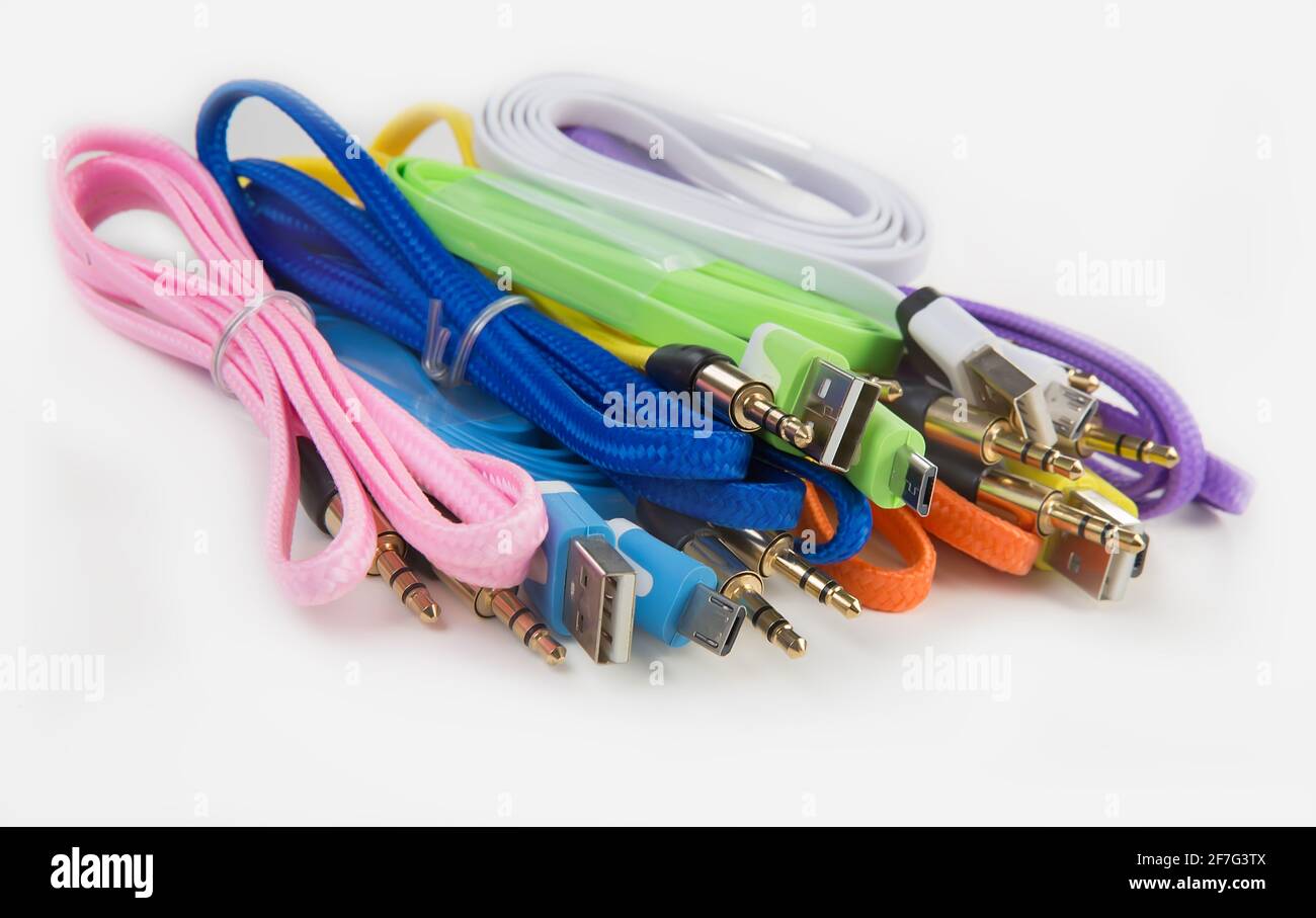 color wires with plugs on white background Stock Photo - Alamy