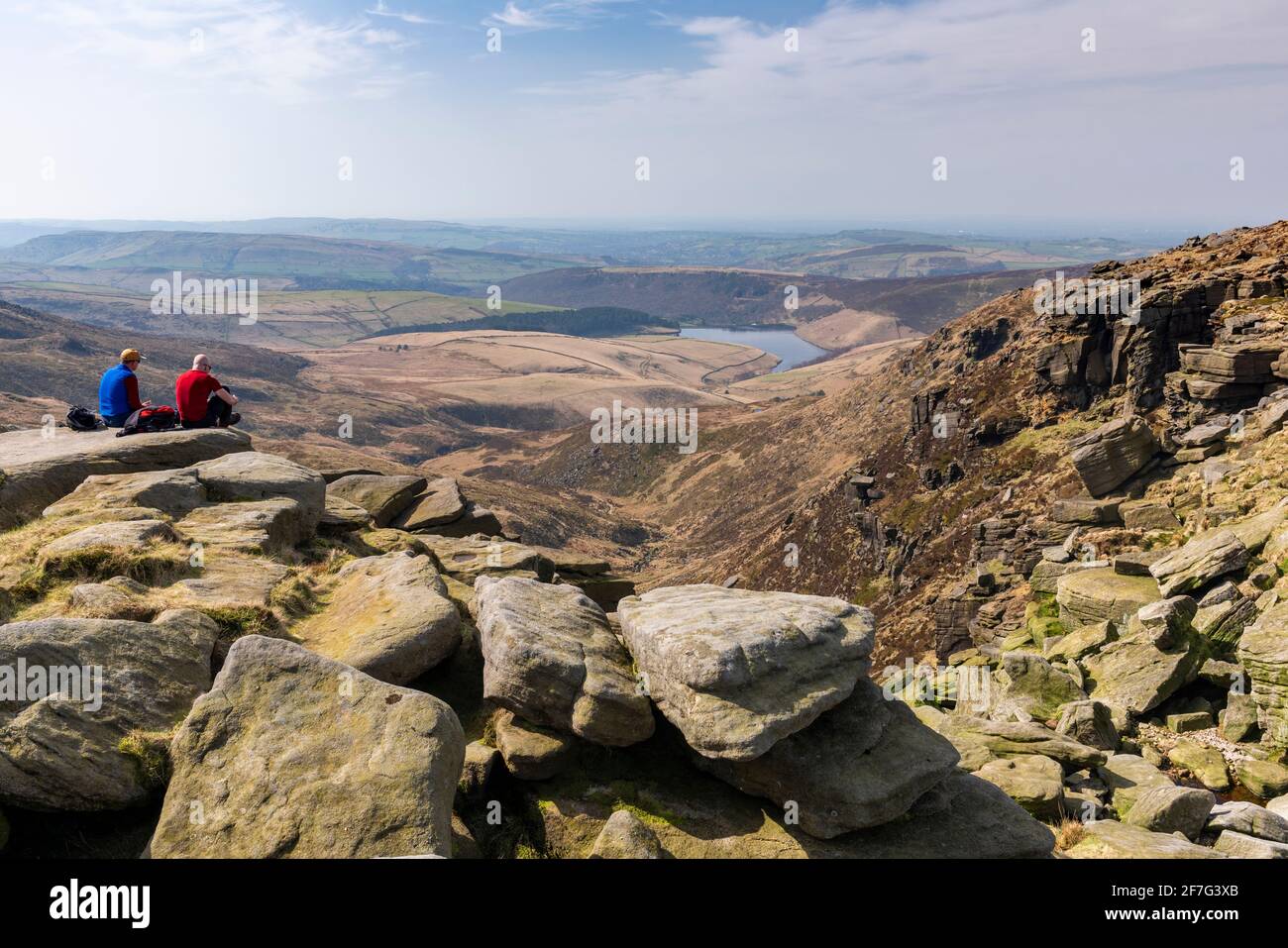 Hikers sitting on Kinder Downfall, Kinder Scout, Peak District National ...