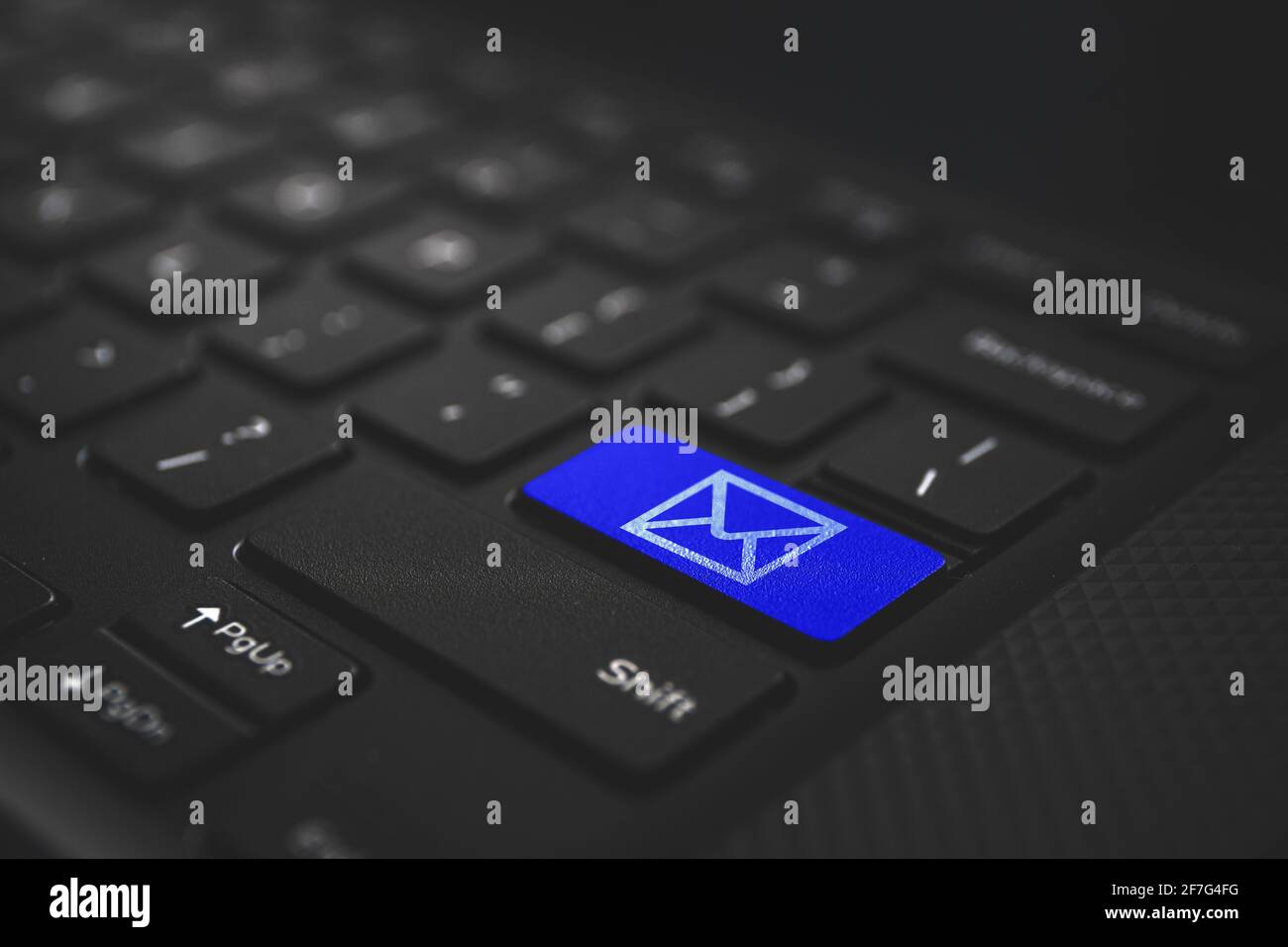 Connect and online communication concept. Email icon on blue laptop ...