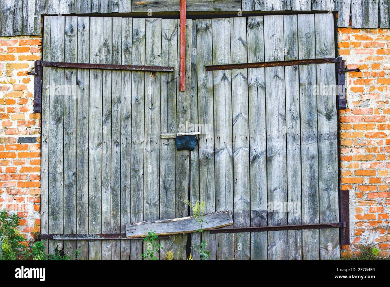 Large old wooden door. Wooden texture with scratches and cracks Stock ...