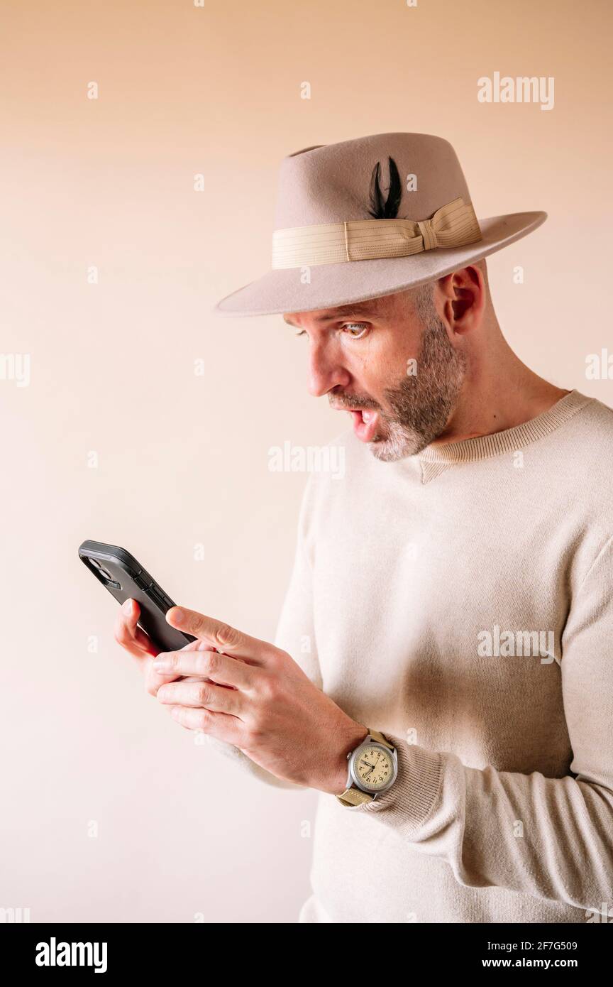 Surprised man in hat hi-res stock photography and images - Alamy