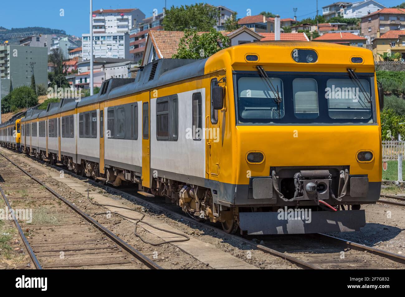 Front view of a regional train, typical of the Portuguese train network ...