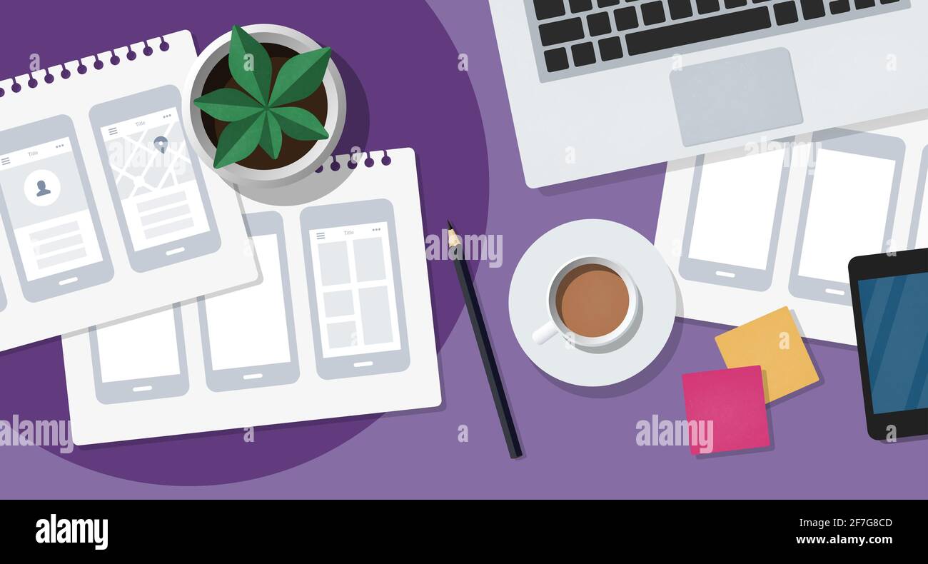 User experience designer desk with mobile app wireframe sketches. UX UI ...