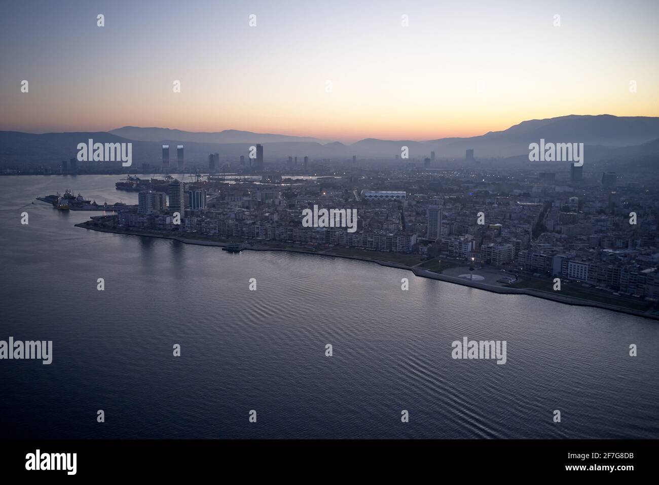 Aerial view of seaside town at sunset Stock Photo - Alamy