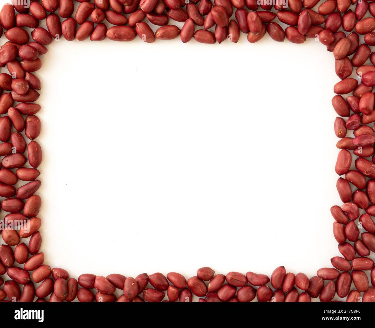 Frame made of Peanuts isolated on white background. Composition with ...