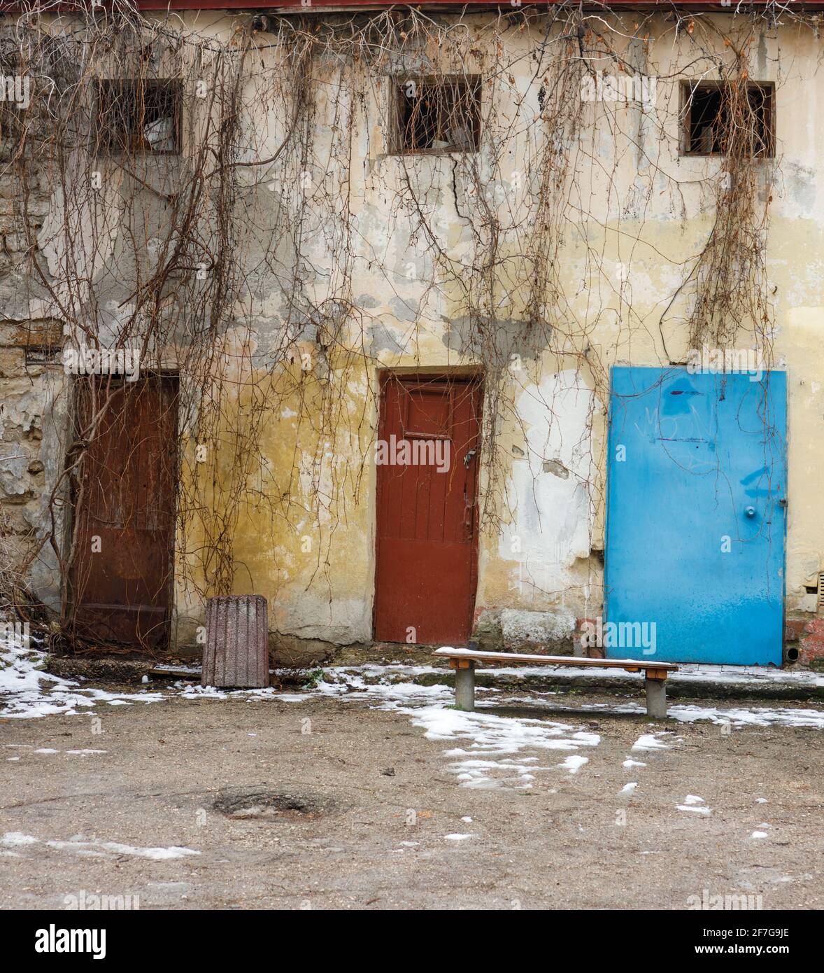 Three doors in an old dilapidated house. The concept of desolation and ...