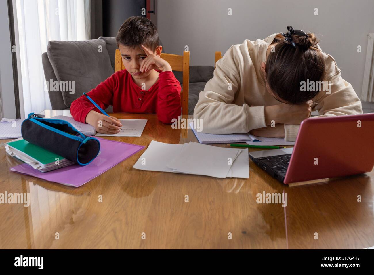 boy doing his homework while lock down, studying remotely Stock Photo ...