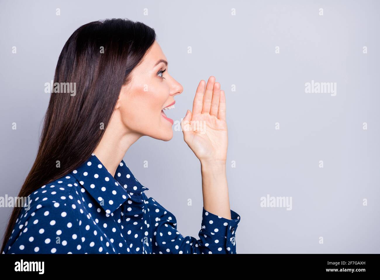 Profile photo of optimistic cute brunette girl tell secret wear blue ...