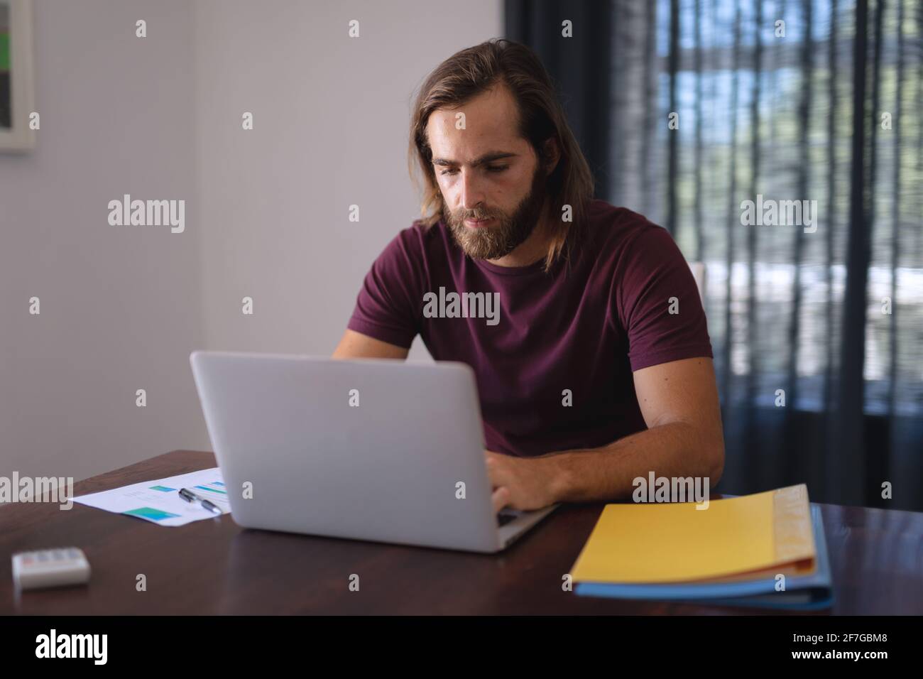 Man working laptop from home hi-res stock photography and images - Alamy
