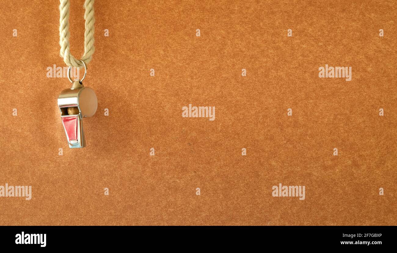 whistle of a soccer coach or referee on sand texture background free ...