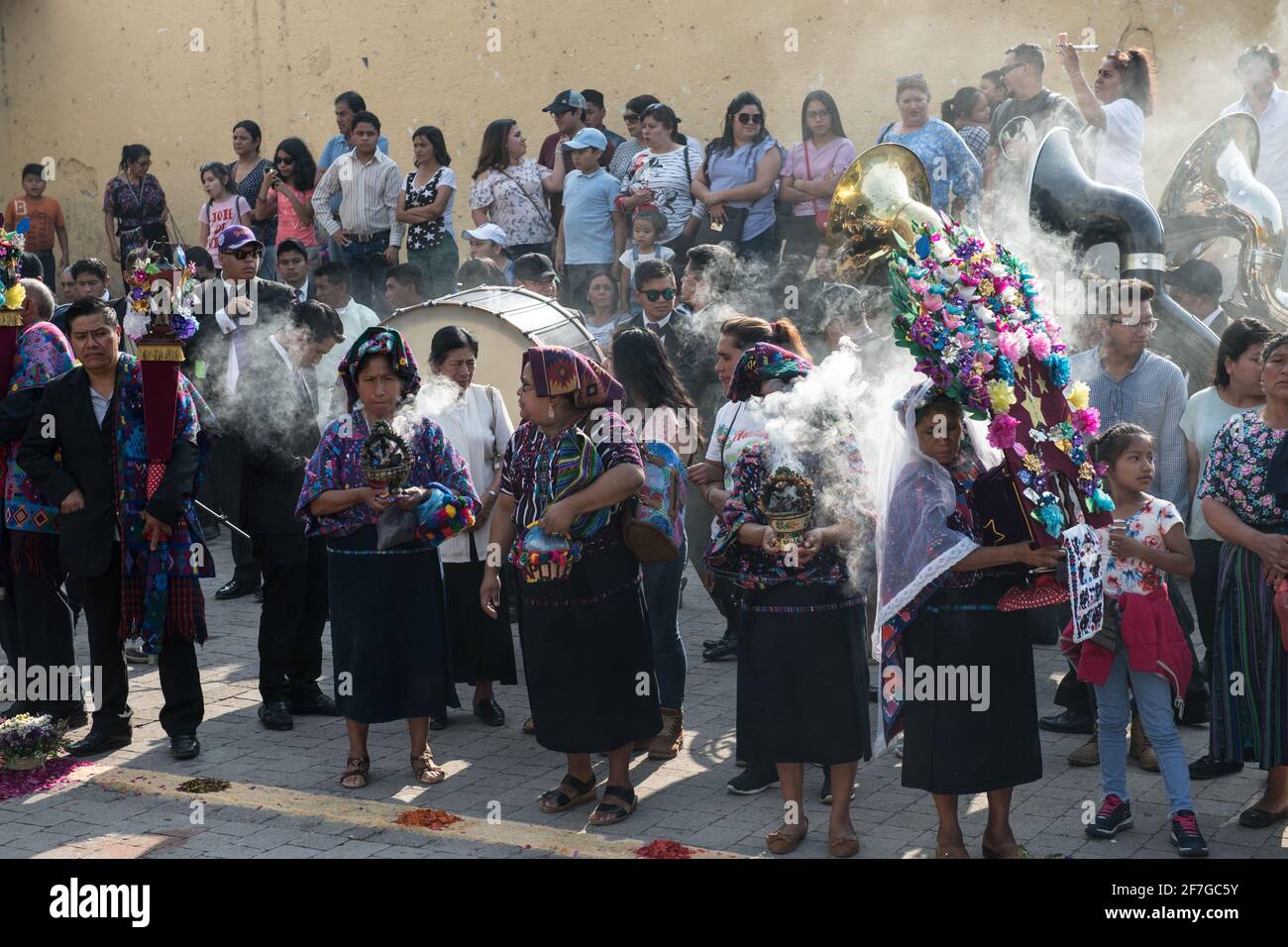 Indigenous Guatemalan women in traditional clothing burn incense during ...