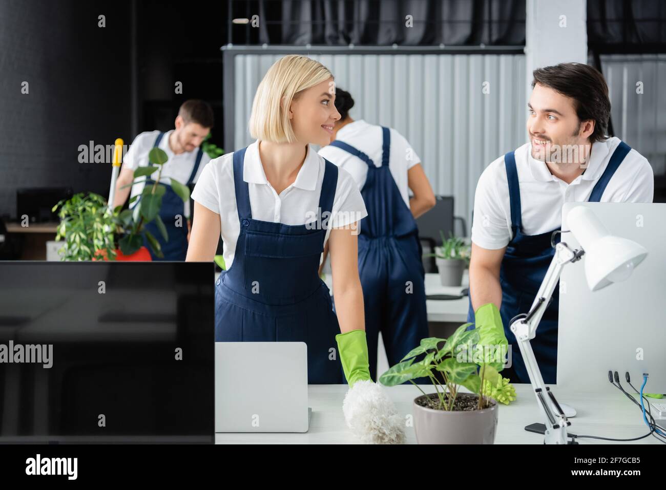 Young men talking near office hi-res stock photography and images - Alamy