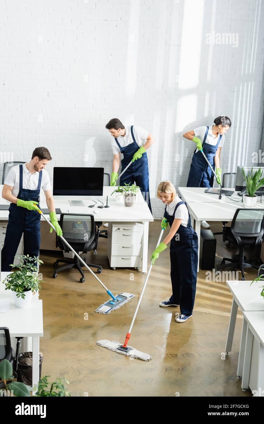 Black woman floor office cleaning hi-res stock photography and images ...