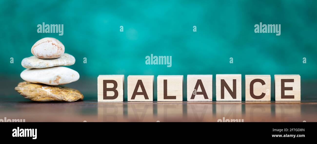 Balance stones on blue background. Web banner with text and cubes Stock ...