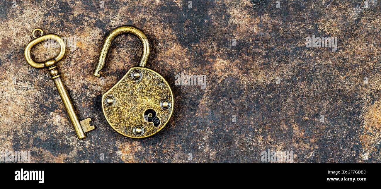 Escape room game concept, old vintage keys on and padlock on a rusty ...