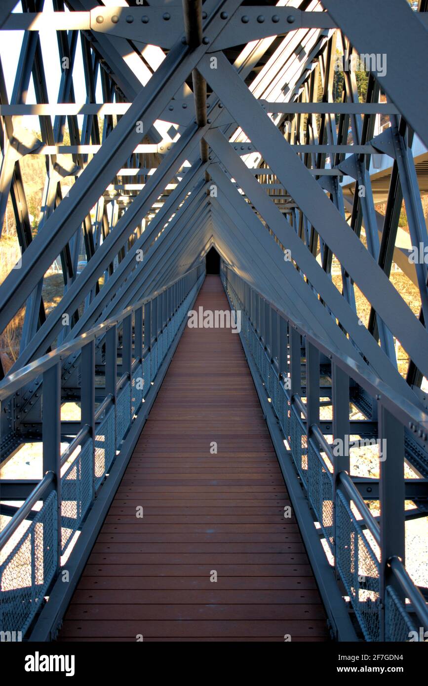 Fascinating walkway under a specific bridge construction over the rhine ...