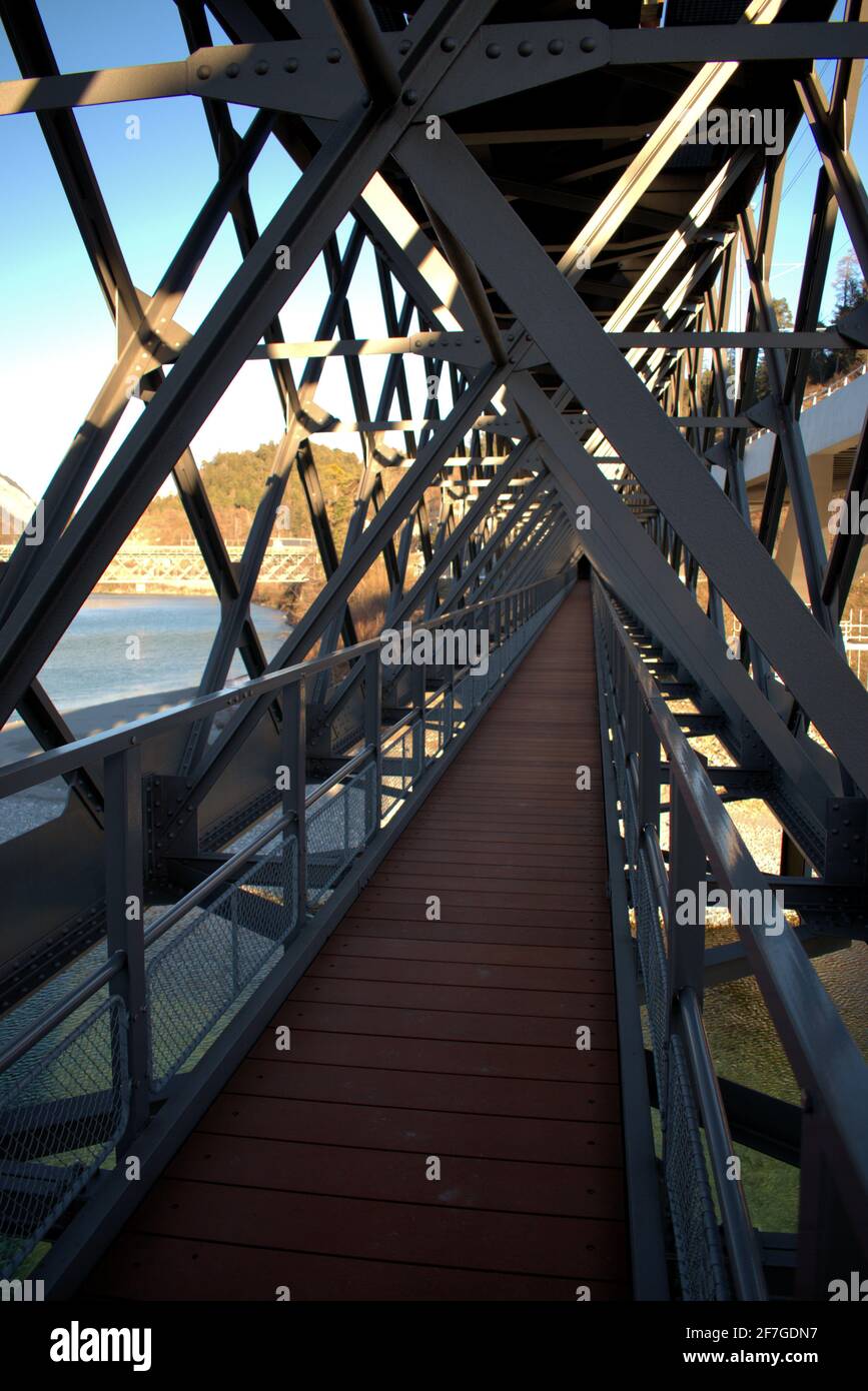 Fascinating walkway under a specific bridge construction over the rhine ...