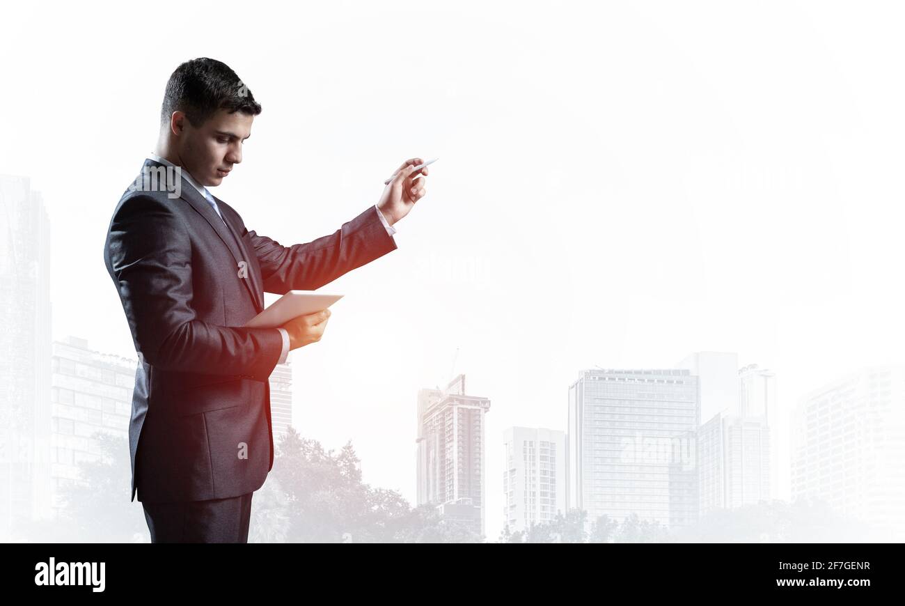 Side view of man in business suit and tie Stock Photo - Alamy