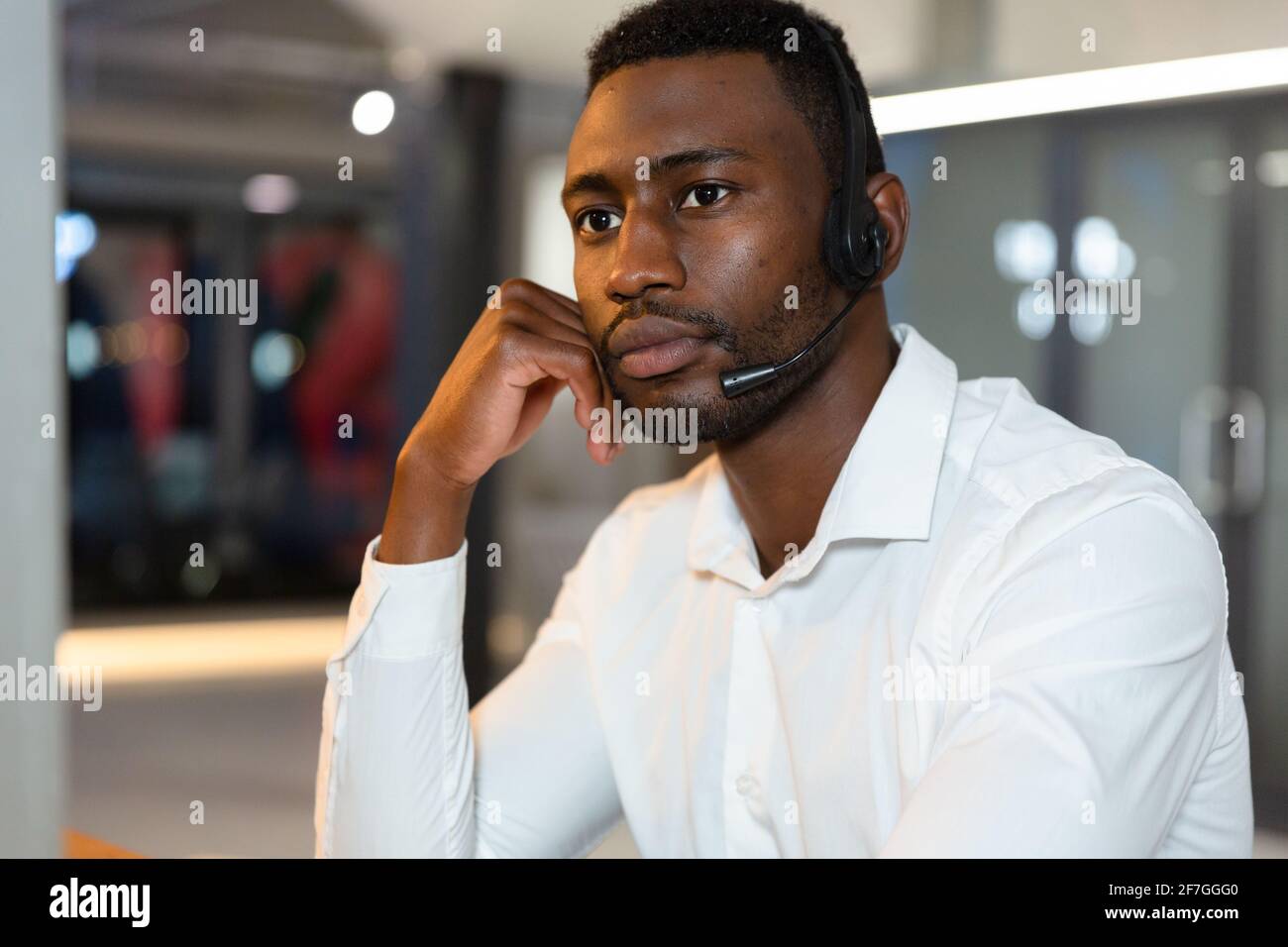 African american businessman sitting desk hi-res stock photography and images - Alamy
