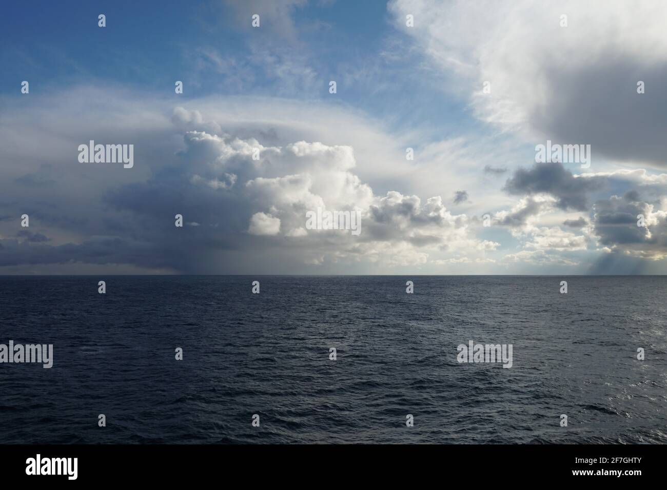 Largely overcast sky with heavy rainfall clouds bringing abundant ...