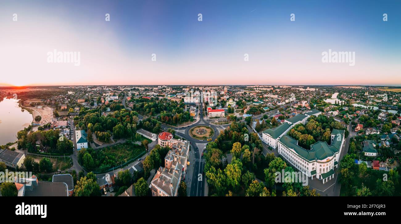 Aerial panoramic view of roundabout road with circular cars in small ...