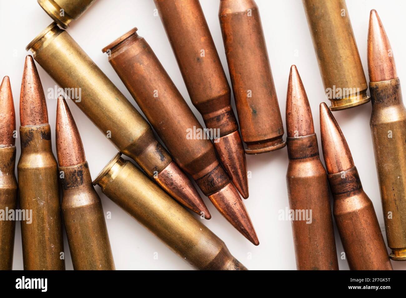 A group of bullet ammunition shells on a white background Stock Photo ...