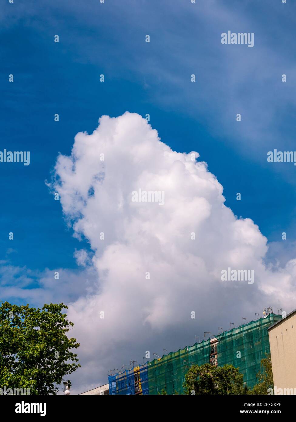 Massive cloud - towering cumulus - forming over building under ...