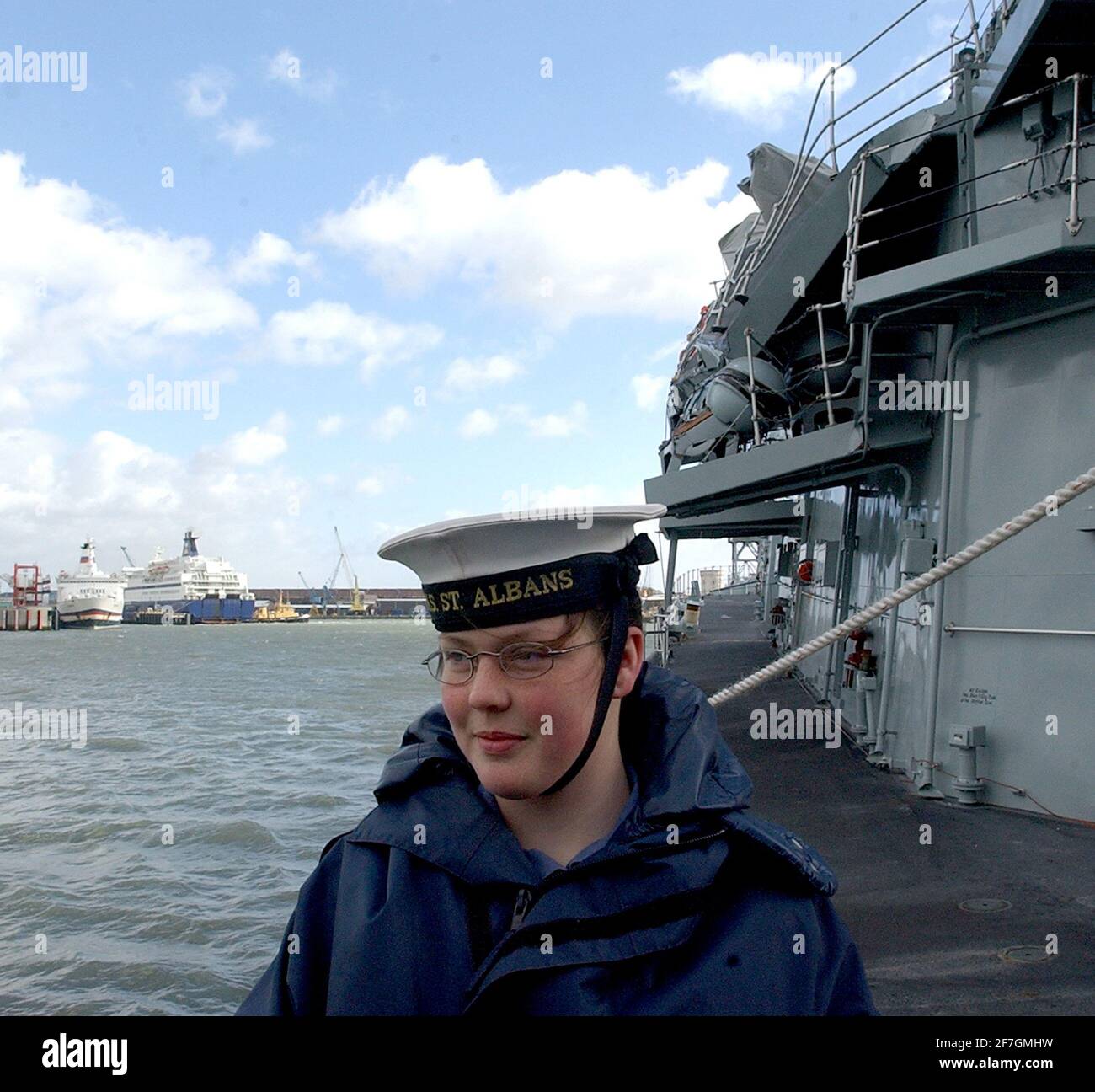 WREN KIM DAVIDSON ALONGSIDE THE MANGLED SUPERSTRUCTURE OF HMS ST ...