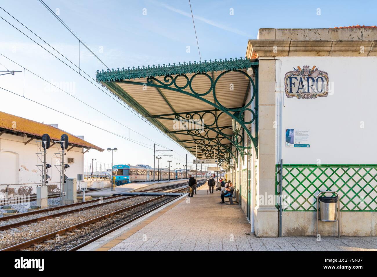 Old man waiting in the train station hi-res stock photography and ...