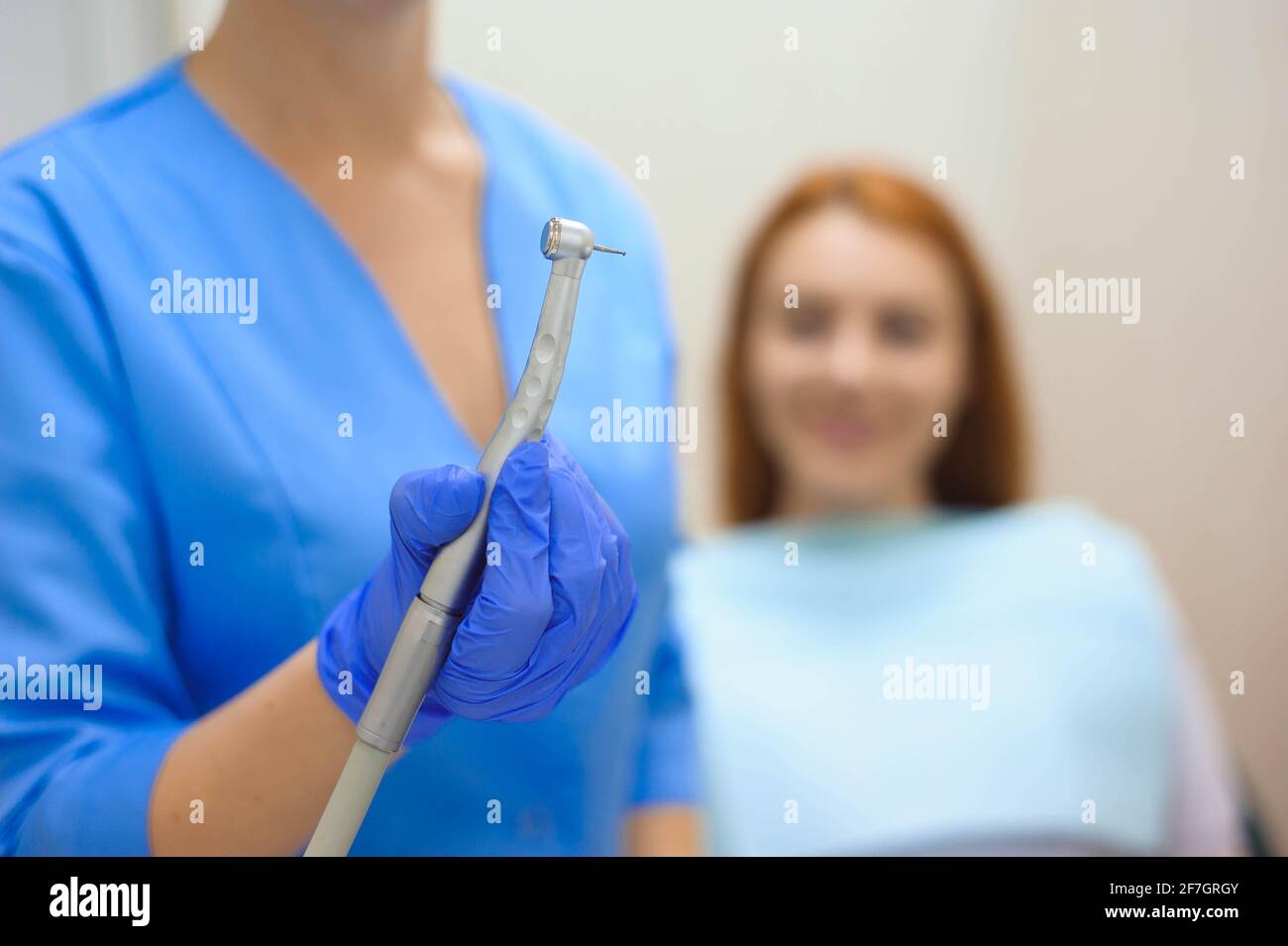 Dental inspection in clinic. Doctor in uniform checking up female ...
