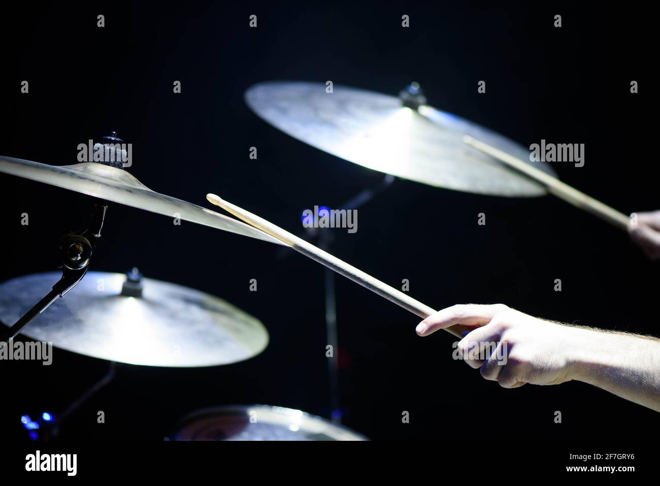 The drummer in action. A photo close up process play on a musical ...