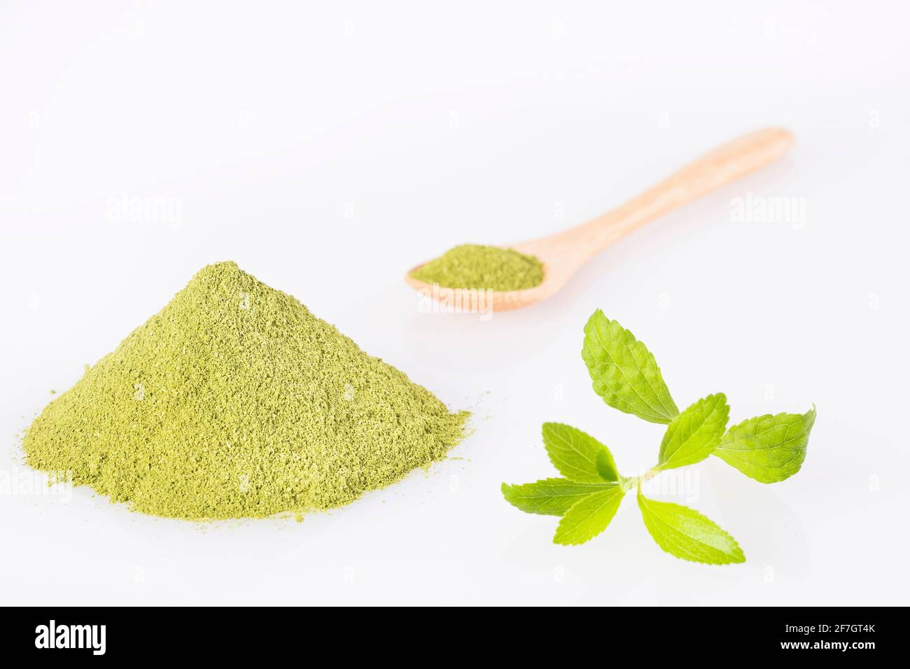 Fresh green Stevia herb and extract powder - Stevia rebaudiana. white ...
