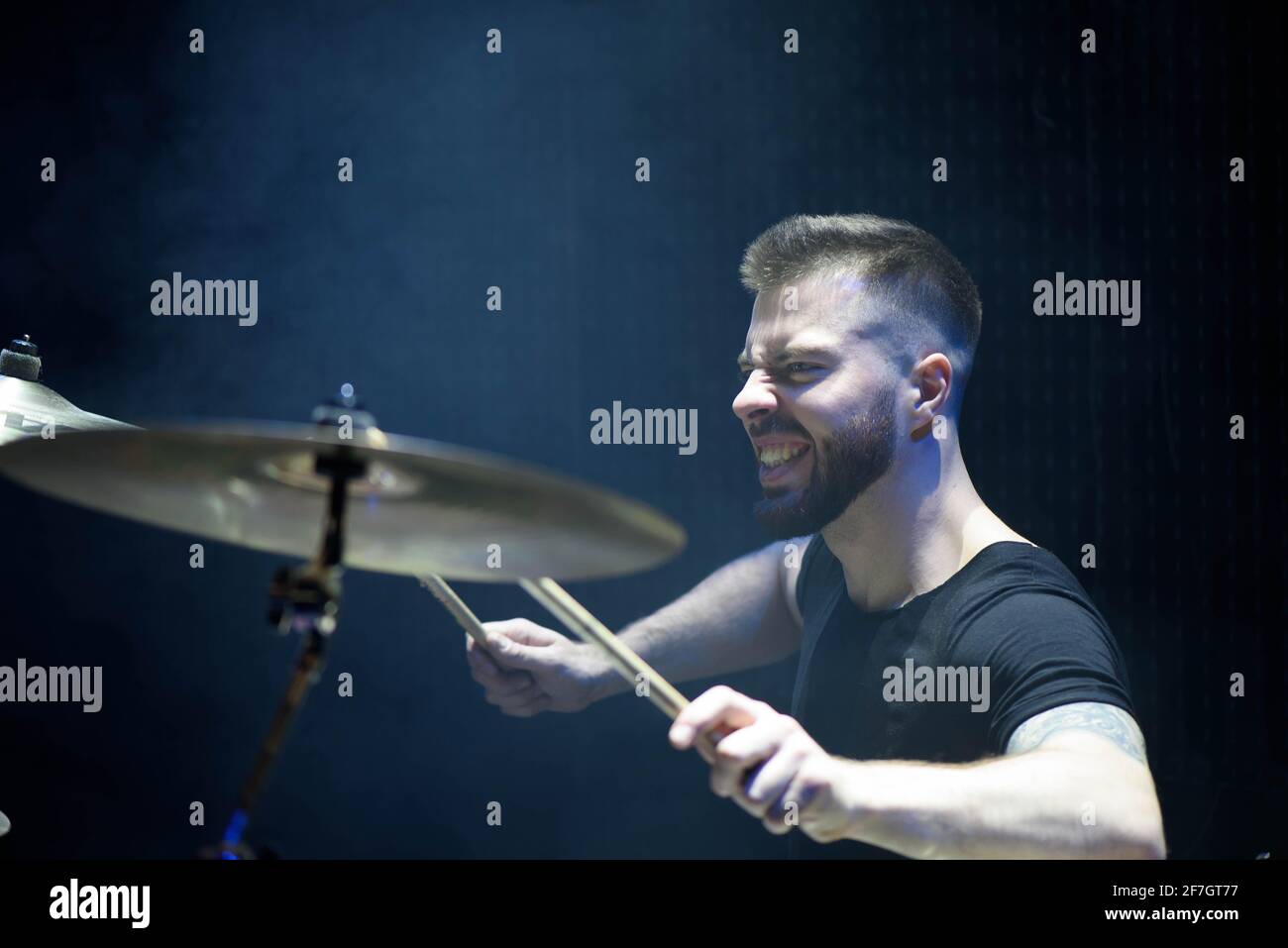 The drummer in action. A photo close up process play on a musical ...