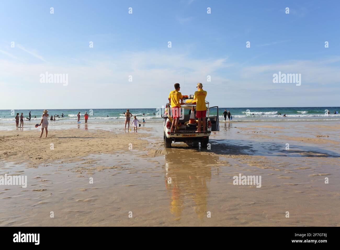 Lifeguards on an RNLI truck, Porthmeor Beach, St Ives, Cornwall, UK ...