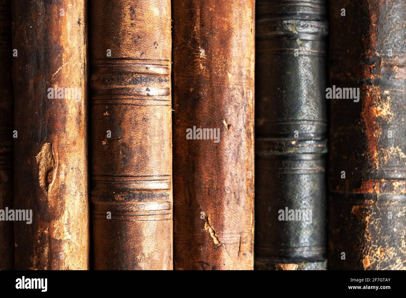 Stack of old books on a library shelf. Vintage books Stock Photo - Alamy