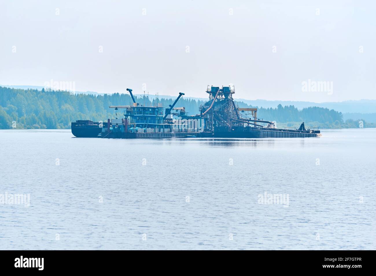floating sand mining plant - dredger and separator - working on the ...
