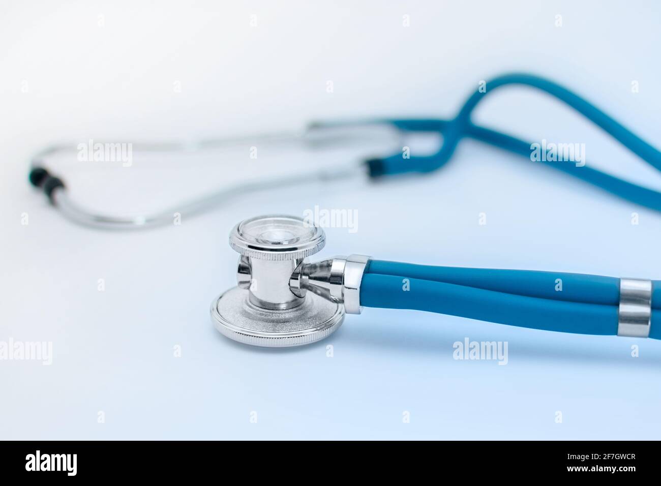 Blue medical stethoscope or phonendoscope on white background. Medical equipment Stock Photo - Alamy