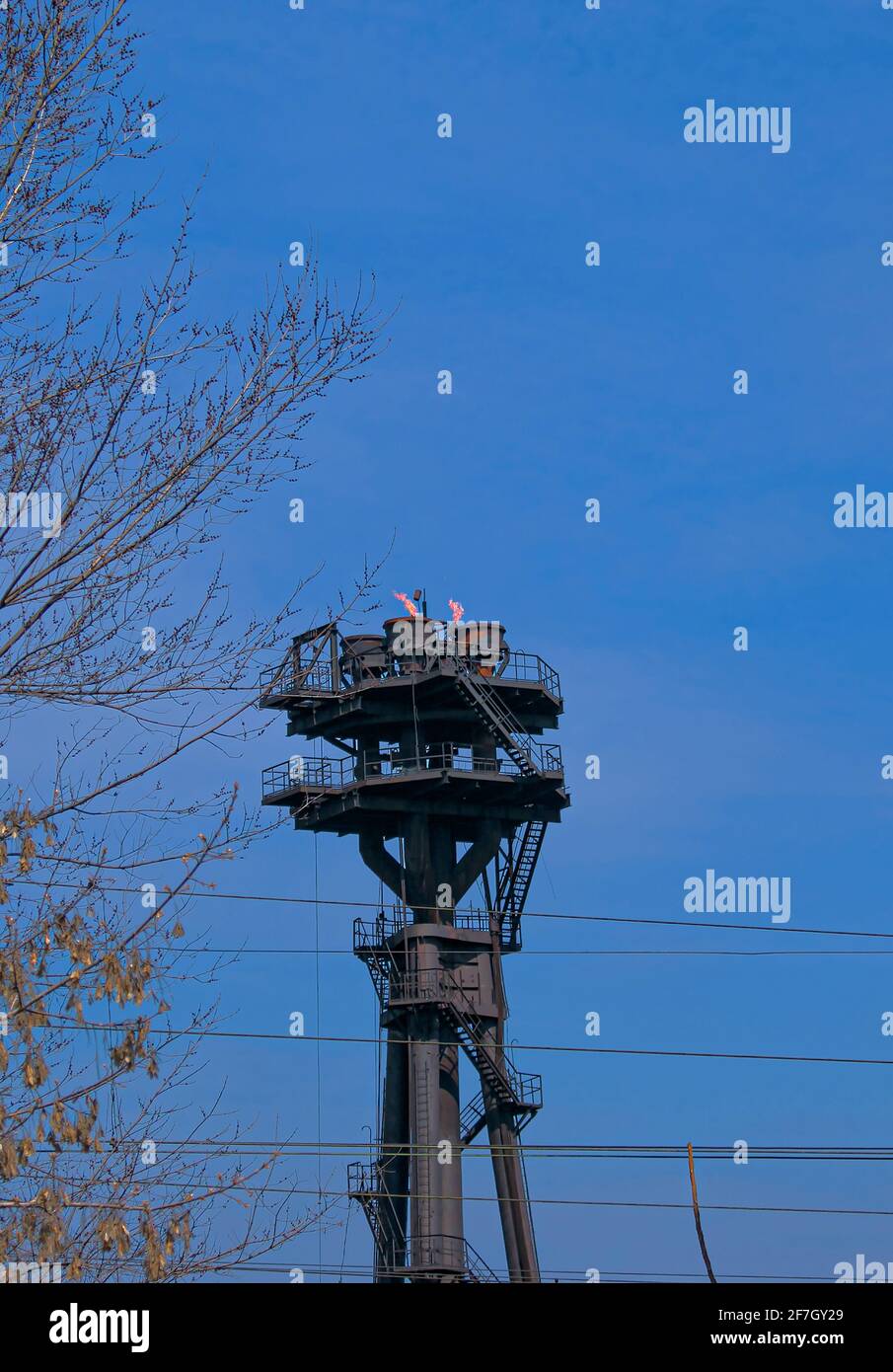 Blast-furnace production. Blast furnace gas outlet consisting of four ...