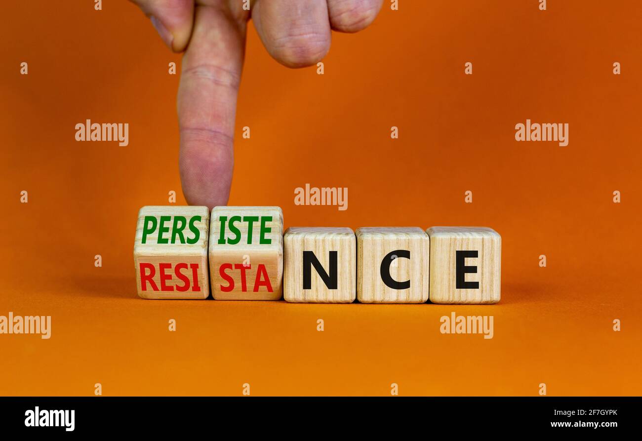 Persistence or resistance symbol. Businessman turns cubes, changes the ...