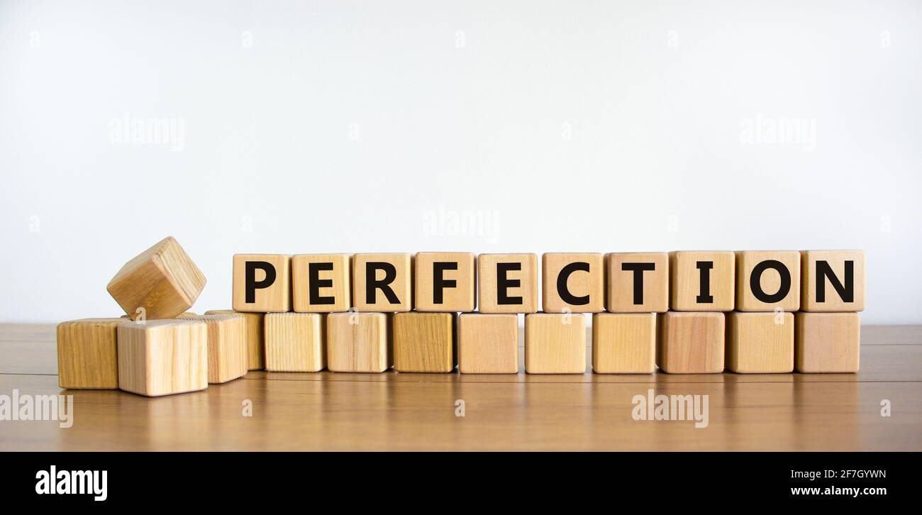 Perfection symbol. Wooden cubes with the word 'perfection'. Beautiful ...