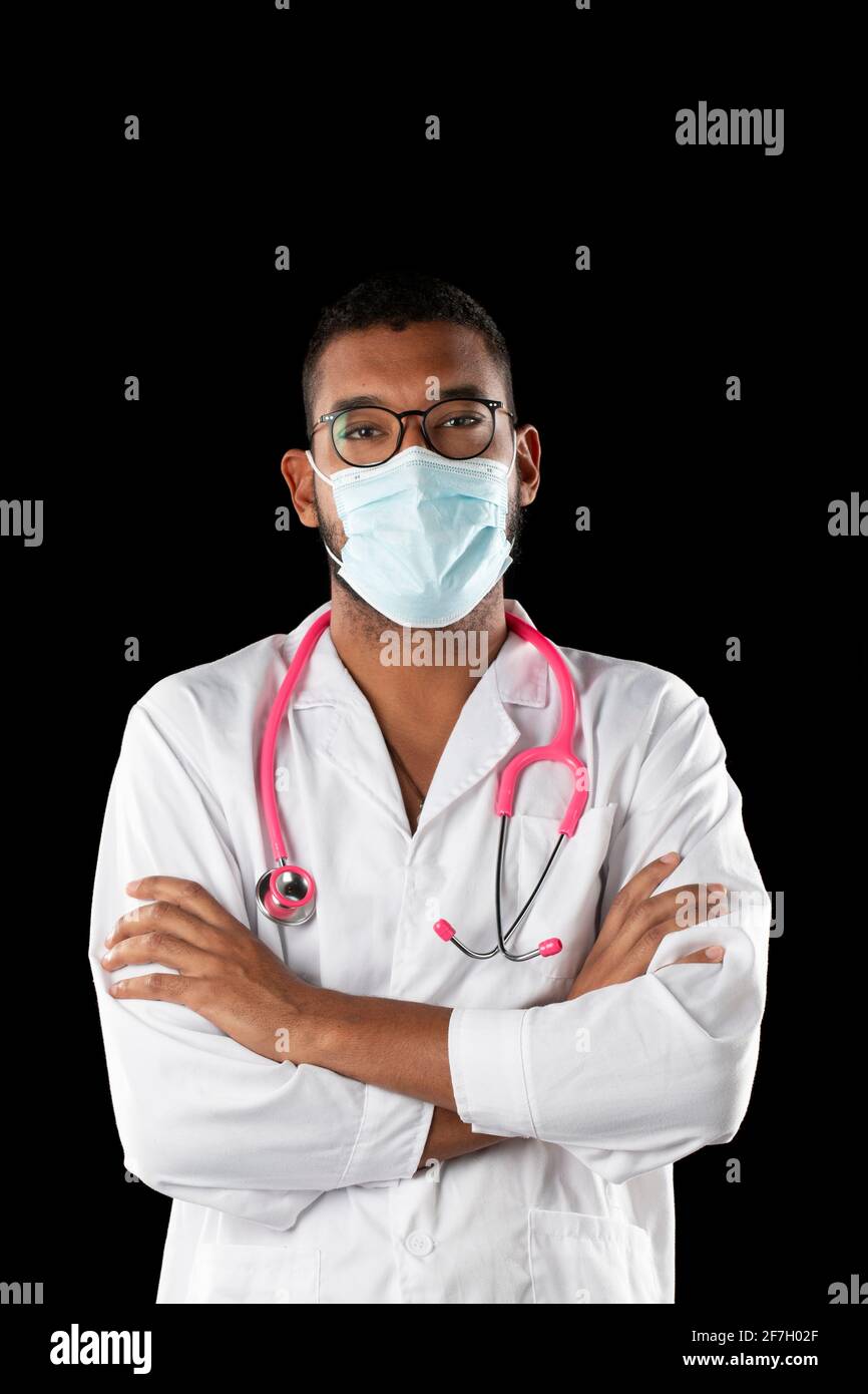 dark skin doctor with pink stethoscope on a black background Stock ...