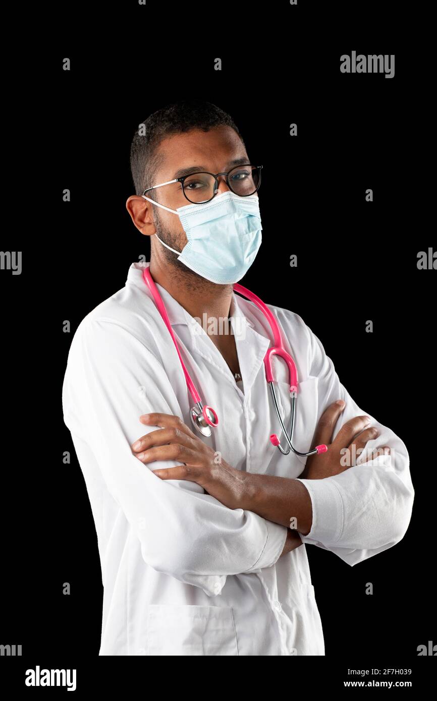 dark skin doctor with pink stethoscope on a black background Stock ...