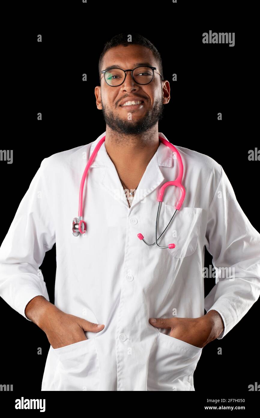 dark skin doctor with pink stethoscope on a black background Stock ...
