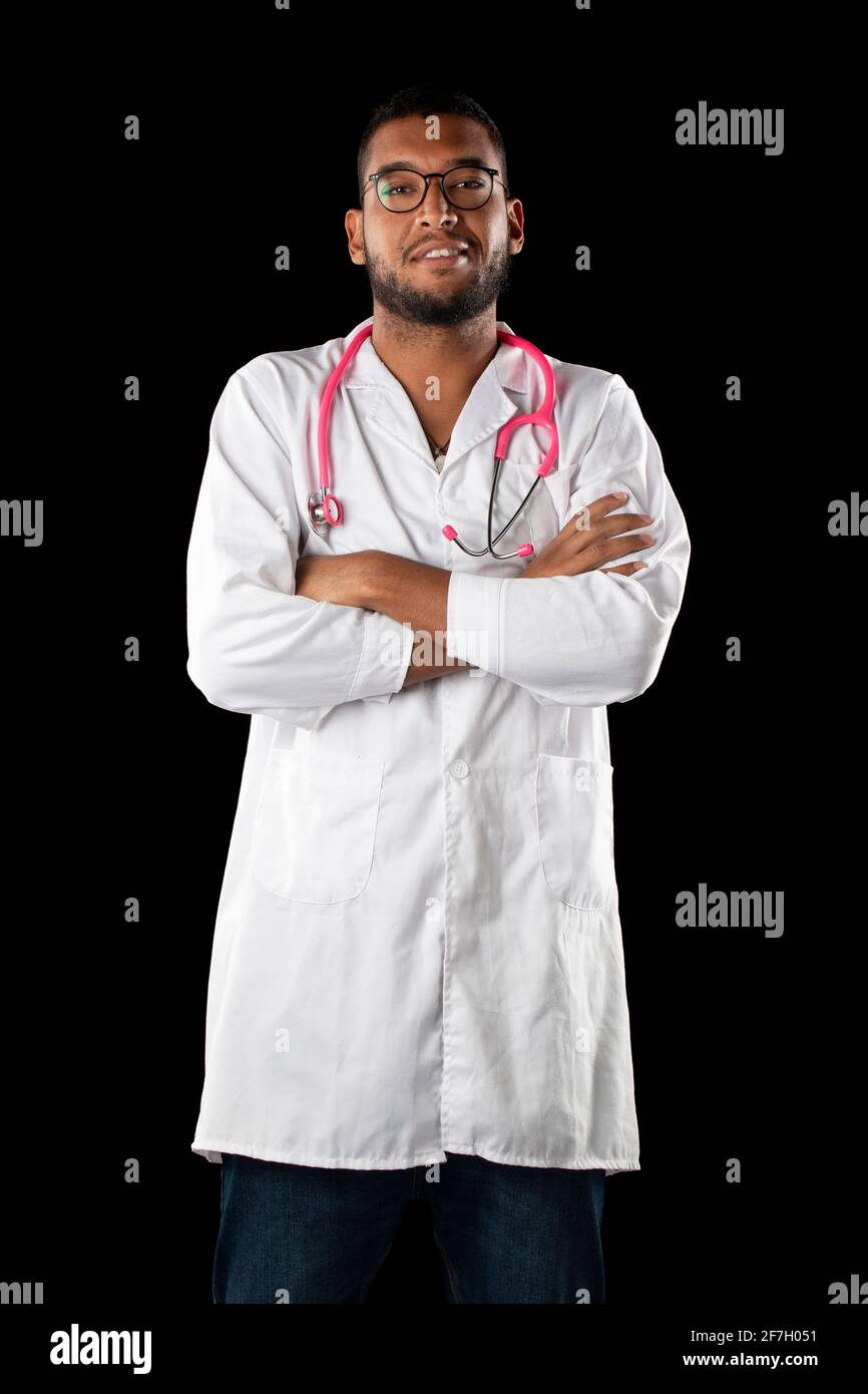 dark skin doctor with pink stethoscope on a black background Stock ...