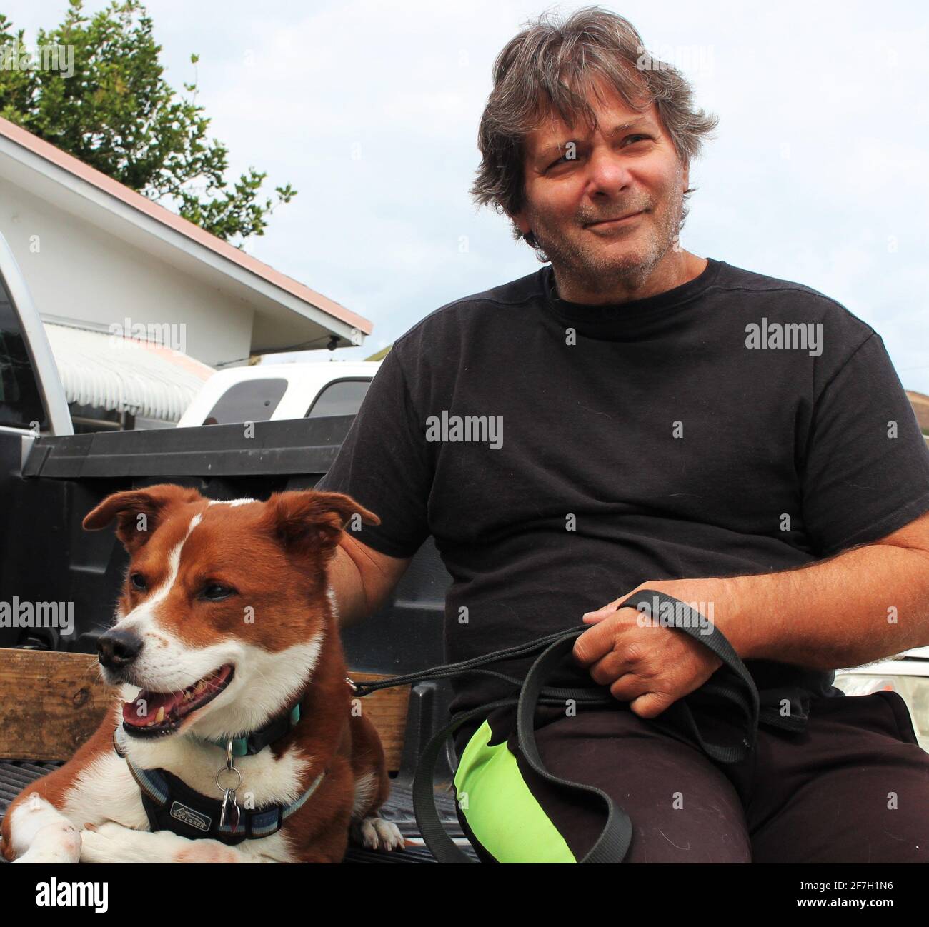 middle aged man and dog outside Stock Photo - Alamy